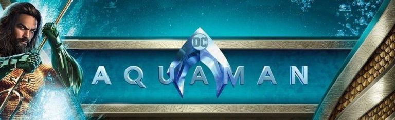 AQUAMAN Sports His Classic Orange And Green Comic Book Costume On This ...
